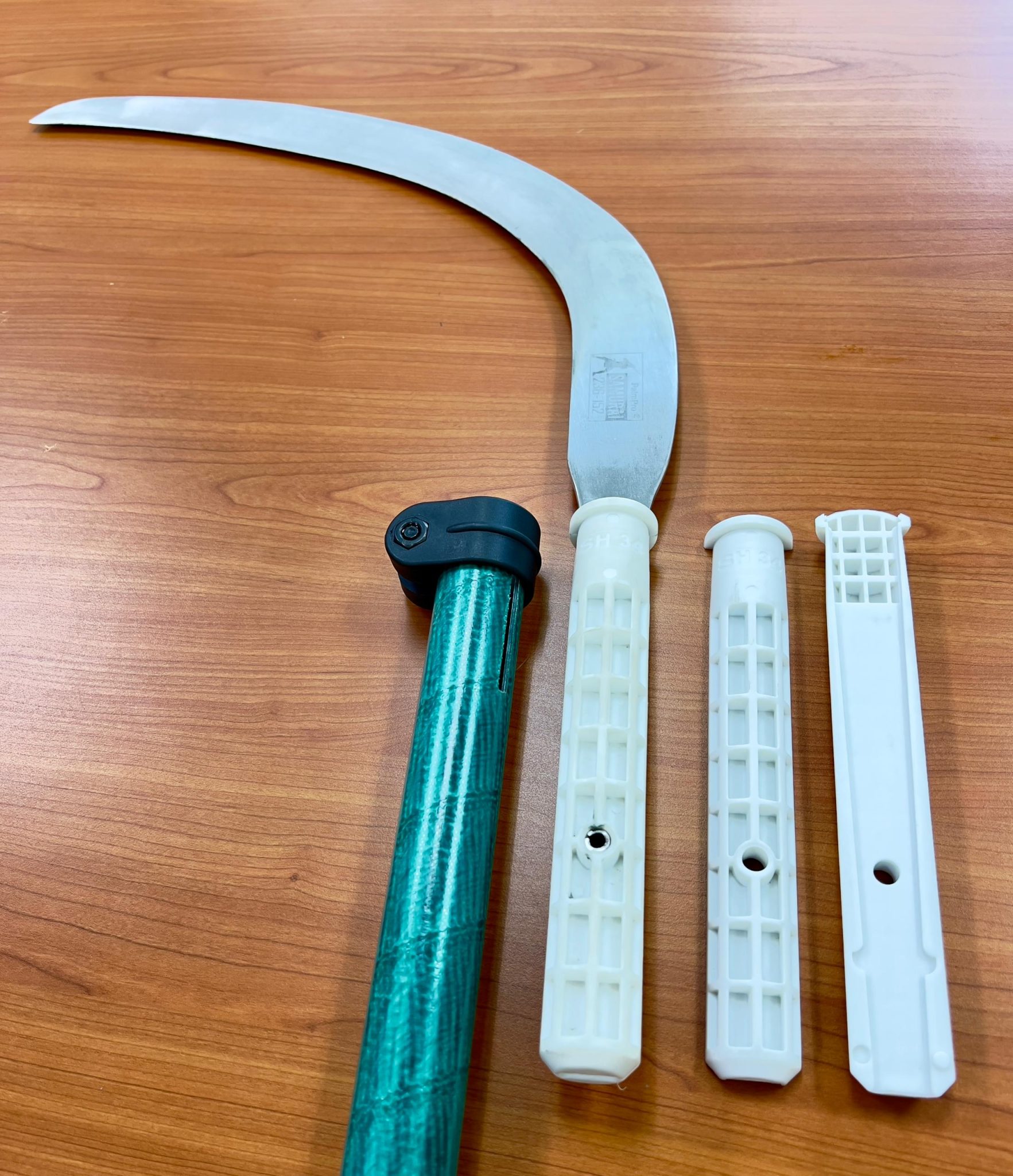 Sickle Holder - TenAsia